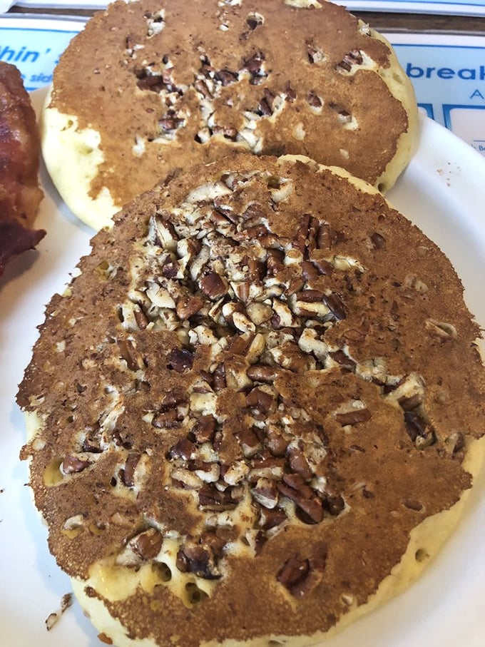 These aren't just pecan pancakes &ndash; they're edible works of art. Golden-brown discs studded with crunchy nuts that somehow manage to be both hearty and cloud-like at once.