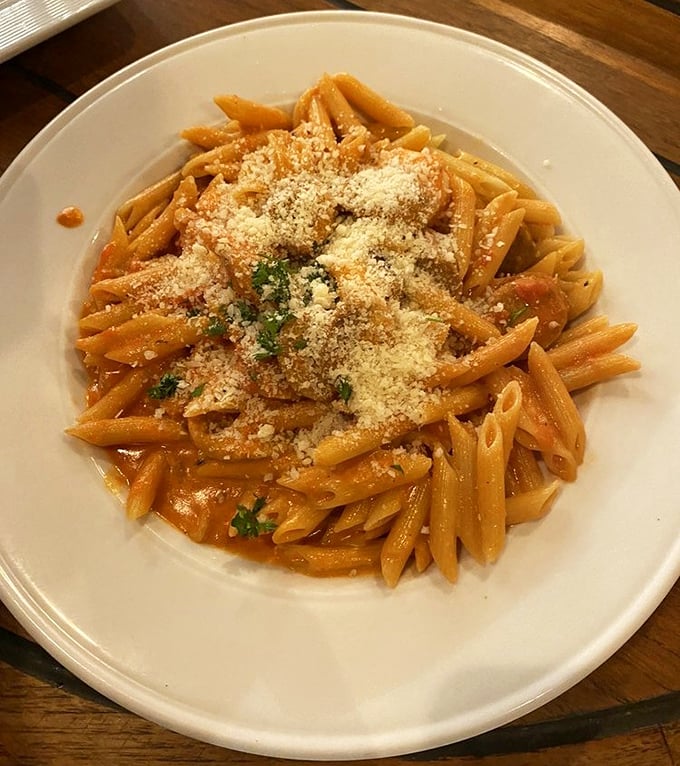 The legendary Penne Rustica arrives like a celebrity&mdash;perfectly al dente tubes bathed in a rich tomato sauce, crowned with a snowfall of Parmesan and fresh herbs.