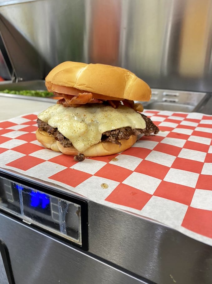 Behold the Pepper Jack masterpiece—where melted cheese cascades over a hand-smashed patty like a dairy waterfall of dreams.