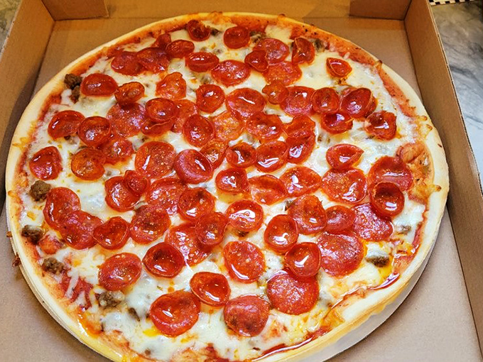 Behold the pepperoni pizza in all its cupped, crispy-edged glory! Those little pools of flavor are nature's way of saying "this is how it's done."