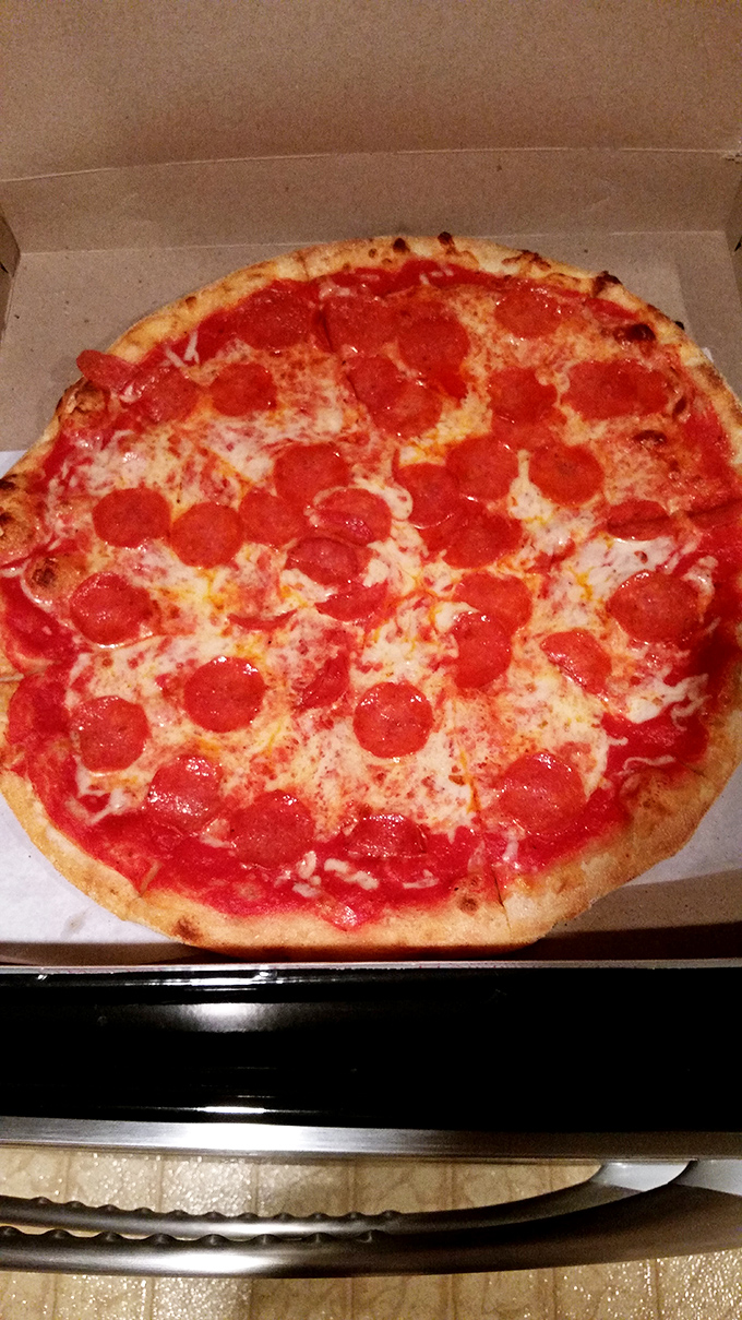 Pepperoni that curls into little flavor cups, cheese that stretches for days&mdash;this is the pizza that launched a thousand local loyalties.