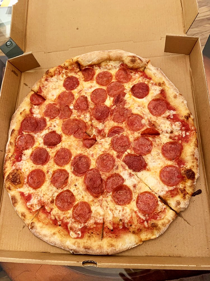 Behold the pepperoni perfection - those crispy cups of joy are basically edible poetry.