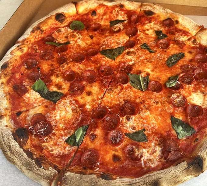 This isn't just pepperoni pizza; it's a masterclass in balance&mdash;crispy cups of pepperoni creating little pools of savory magic atop that perfect cheese-to-sauce ratio.