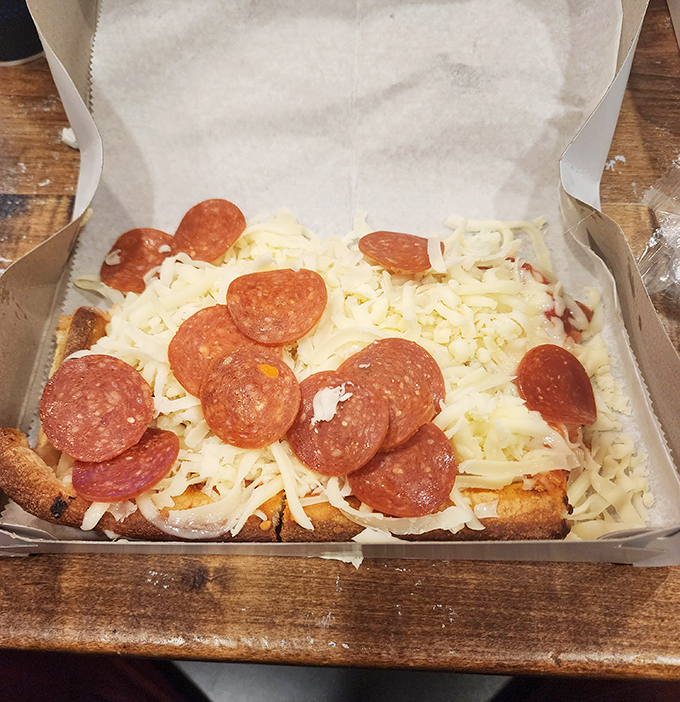 Behold the Beto's revelation: hot crust and sauce crowned with cold cheese and pepperoni. It's like pizza decided to wear its Sunday best instead of melting into conformity.