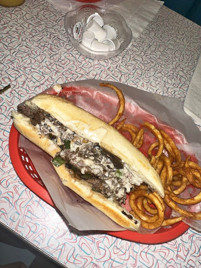 The legendary Philly Cheesesteak in all its glory&mdash;where thinly sliced ribeye meets melted cheese in a relationship more perfect than most rom-coms.