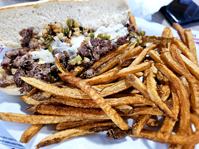 This Philly cheesesteak doesn't need Philadelphia's approval&mdash;the perfectly seasoned beef, melted cheese, and golden fries create a harmony that would make any sandwich lover swoon.