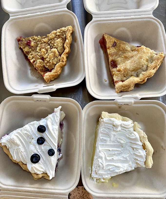 Pie heaven exists in takeout containers. The blueberry cream masterpiece in the corner would make even the most disciplined dieter weaken at the knees.