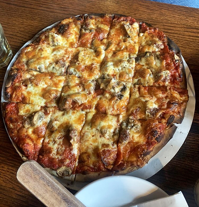 This isn't just pizza; it's an Upper Peninsula masterpiece with perfectly melted cheese and toppings that know their place in the grand scheme.