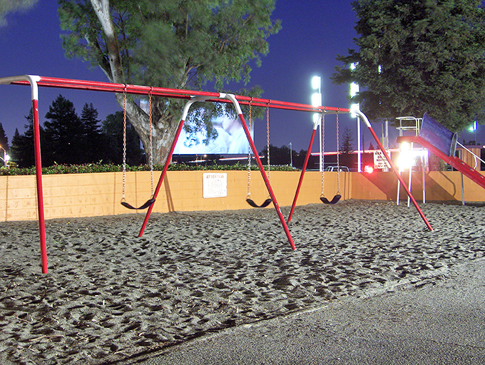Childhood memories in the making! This playground area lets the little ones burn energy before settling in for the feature presentation.