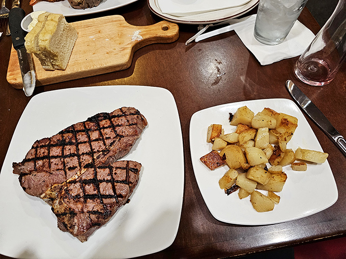 Perfect grill marks tell no lies. This beautifully seared steak with a side of home fries is the kind of plate that makes conversation stop and eyes widen.