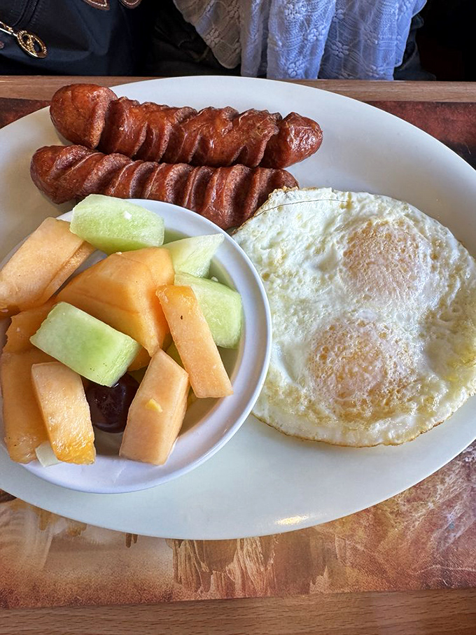 The star of the show: Portuguese sausage with its perfect snap, served alongside sunny eggs and fresh fruit. This is why ferries were invented.