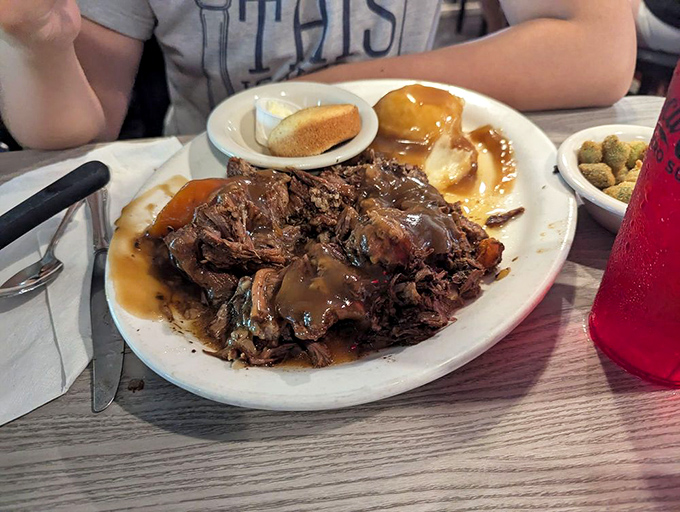 This pot roast isn't just fork-tender, it's surrendered completely. The gravy alone could make a vegetarian question their life choices.