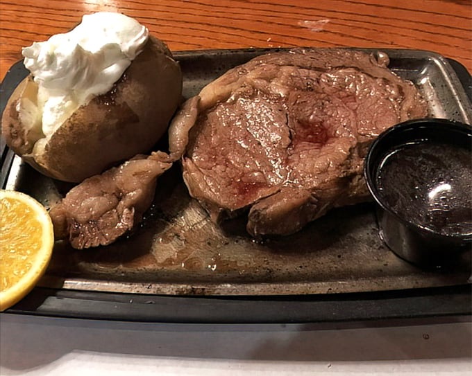 Ladies and gentlemen, the star of our meaty show! This prime rib is so tender, it practically melts on the plate. Resistance is futile. 