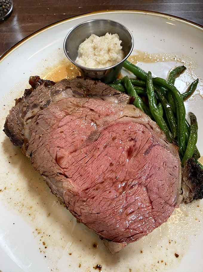The star of the show: prime rib cooked to that perfect shade of pink, accompanied by green beans that actually deserve to share the plate.
