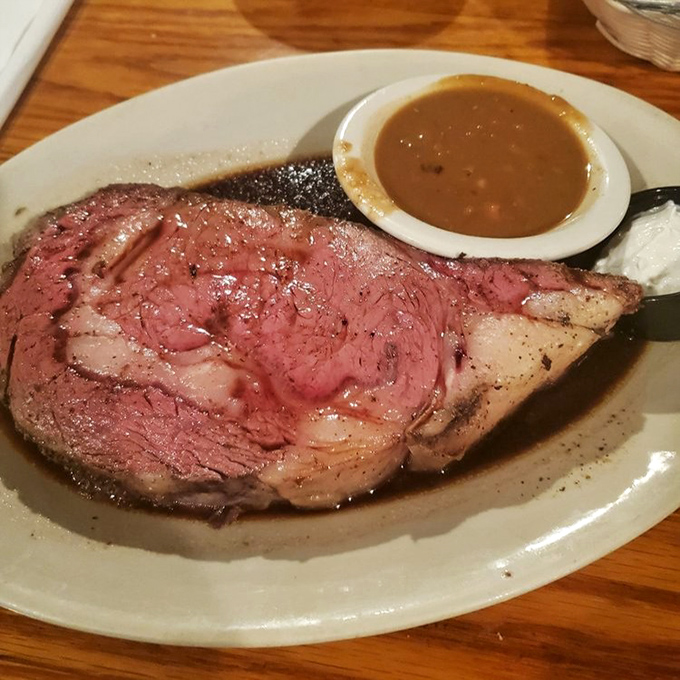 Behold the star of the show: prime rib so perfect it could make a vegetarian reconsider life choices.