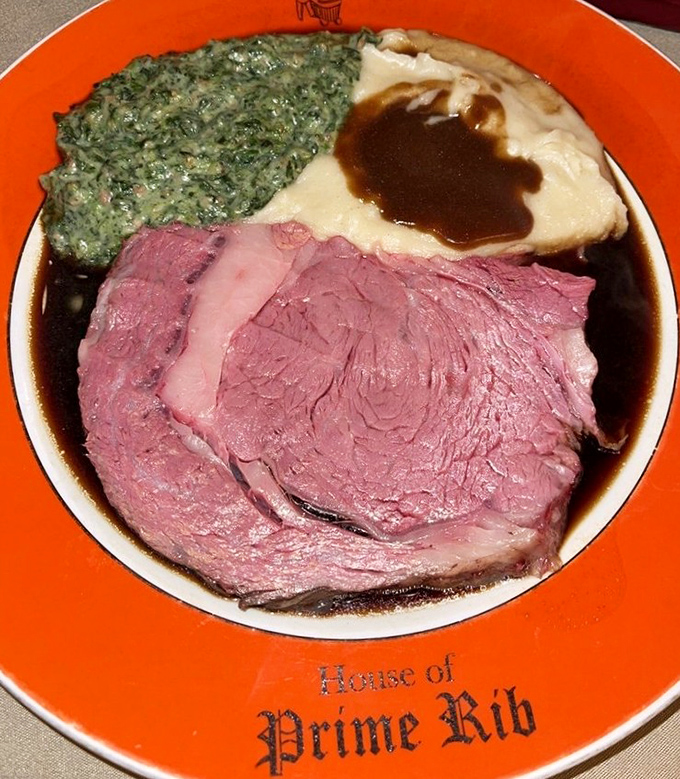 Behold the star of the show: perfectly pink prime rib with creamed spinach and mashed potatoes. Meat nirvana achieved in spectacular fashion.