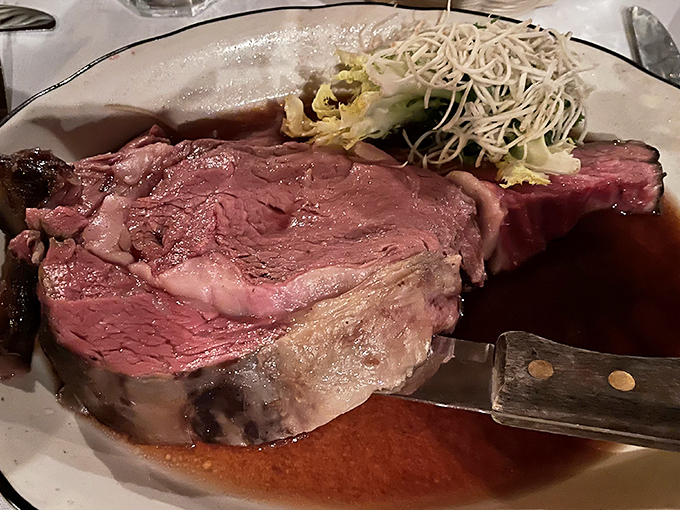 The prime rib arrives like a carnivore's dream painting&mdash;perfectly pink, glistening with jus, and generous enough to make your cardiologist wince.