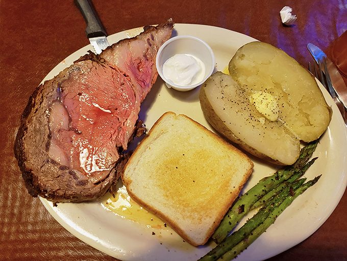 Behold the star of the show: prime rib so perfectly cooked it makes you wonder if the chef has some sort of meat telepathy. That horseradish sauce is the perfect sidekick.