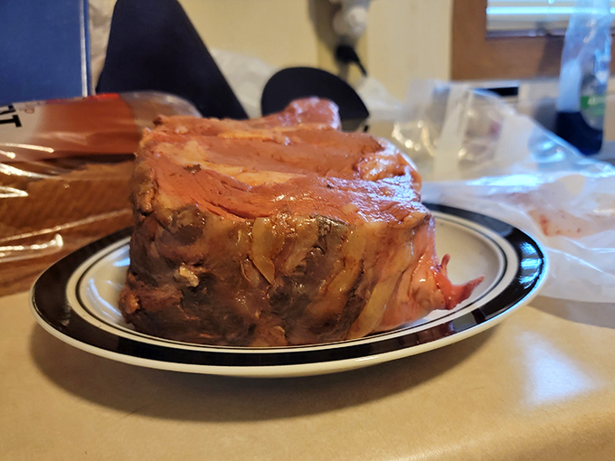Behold the star of the show &ndash; prime rib so perfectly roasted it practically poses for its close-up. This isn't dinner; it's a masterpiece.