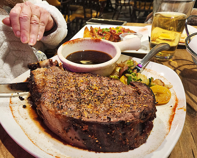 Behold the star attraction&mdash;a perfectly seasoned prime rib with a seasoned crust that would make even vegetarians reconsider their life choices.