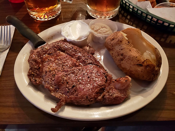 The star of the show in all its glory – a perfectly seasoned prime rib that makes you wonder why you ever bothered with fancy steakhouses.