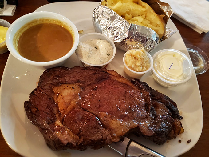 Behold the star attraction: prime rib so perfectly cooked it makes you wonder if you've been eating cardboard all these years. The au jus cup? Liquid gold. 