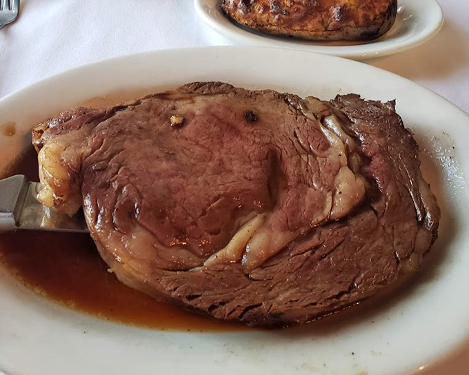 This prime rib isn't just a meal; it's a carnivorous masterpiece that makes vegetarians question their life choices from across the room.