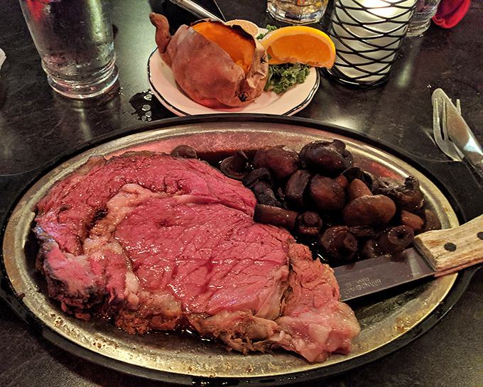 Prime rib so perfectly pink it could make a vegetarian question their life choices. Those mushrooms aren't just along for the ride either.
