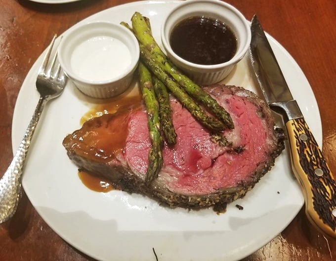 Behold the prime rib in all its glory&mdash;perfectly pink, herb-crusted, and accompanied by asparagus that actually makes vegetables exciting.