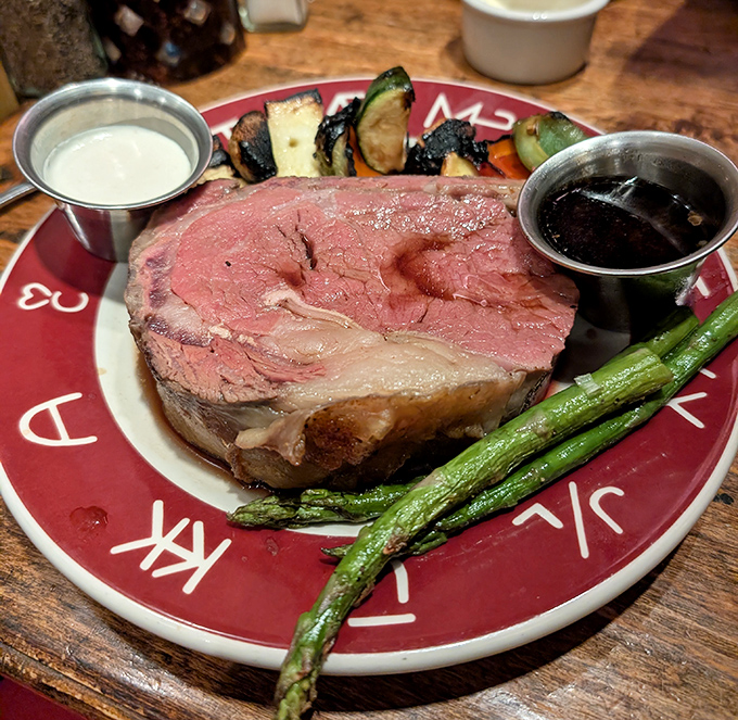 This isn't just prime rib – it's a masterclass in meat, where perfectly pink interior meets savory crust in beef harmony.