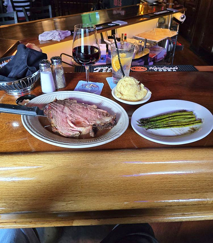 The star of the show: prime rib cooked to a perfect medium-rare, accompanied by asparagus and a Yorkshire pudding that would make a British grandmother weep with joy.