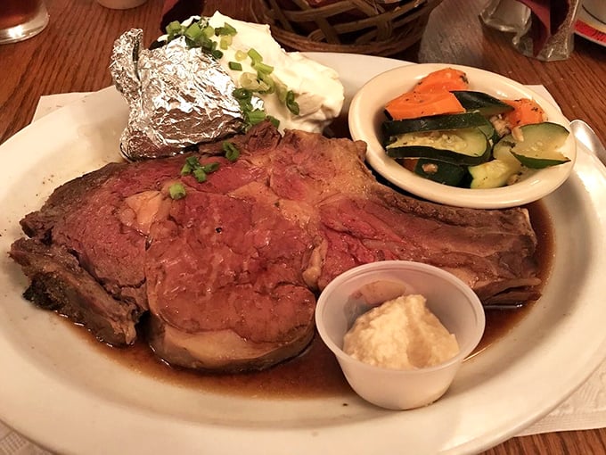 Behold the star of the show: prime rib so perfectly pink it makes other steaks blush with envy, accompanied by its loyal sidekicks.