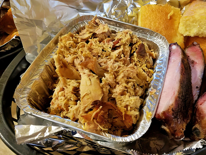 This pulled chicken doesn't just fall apart&mdash;it practically surrenders to your fork, waving a tiny white flag made of smoky goodness.