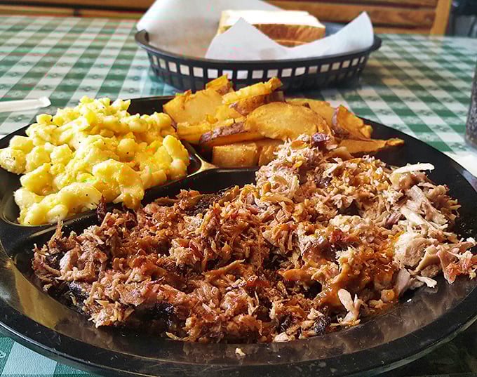 Pulled pork with that perfect mix of bark and tender meat, flanked by mac and cheese that would make your grandmother jealous.