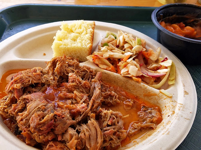 Pulled pork so tender it practically pulled itself, paired with cornbread that would make your grandmother jealous and slaw that cuts through the richness perfectly.