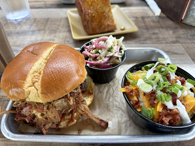 This pulled pork sandwich arrives looking like it dressed up for a first date with your taste buds.