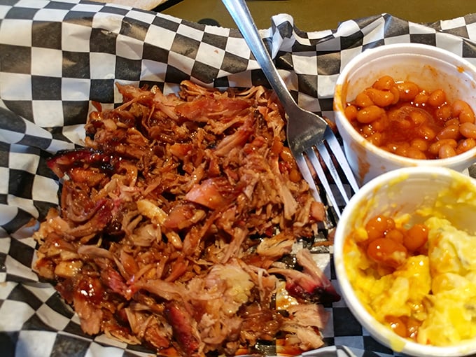 Behold the pulled pork masterpiece - tender, smoky perfection that'll make your taste buds sing.