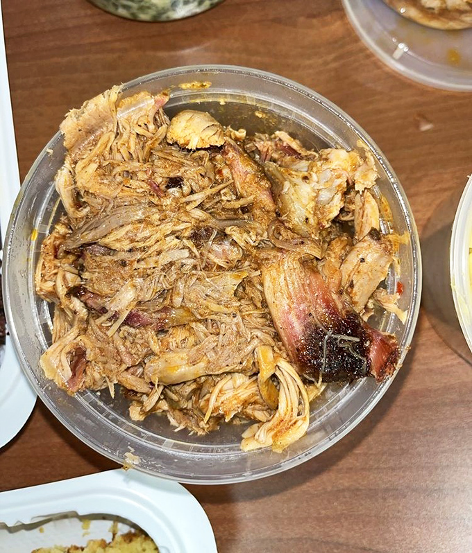 Pulled pork so tender it practically surrenders at the sight of your fork, with those coveted crispy bark bits mixed throughout.