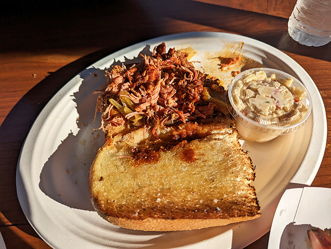 This pulled pork sandwich isn't just lunch&mdash;it's an edible love letter from the South, delivered with a side of creamy slaw.