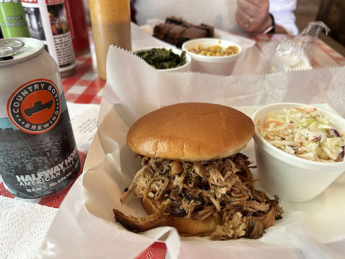 This pulled pork sandwich isn't just food&mdash;it's architecture. The meat-to-bun ratio achieves that perfect balance where neither tries to upstage the other.