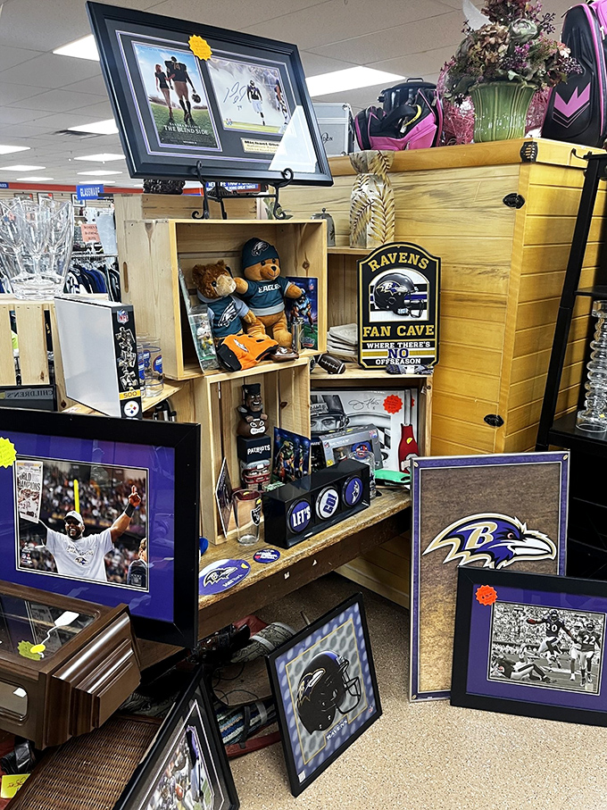 Ravens fans, your cave awaits! Sports memorabilia section proves one person's decluttering is another's fan shrine-in-the-making.