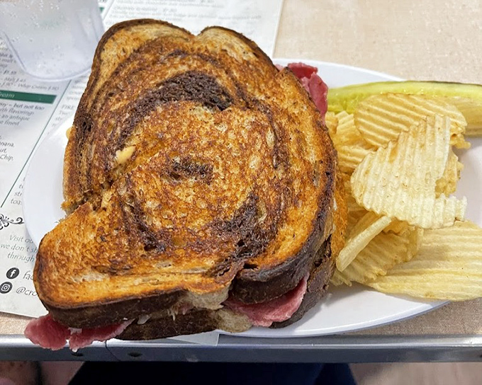 Behold the Reuben in its natural habitat&mdash;perfectly grilled, gloriously stacked. This sandwich doesn't just satisfy hunger; it creates lifelong memories. 