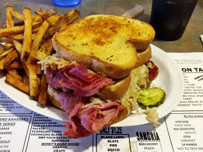 The legendary Reuben in all its glory &ndash; towering corned beef, tangy sauerkraut, and melted Swiss on perfectly grilled rye. Worth every napkin you'll need.