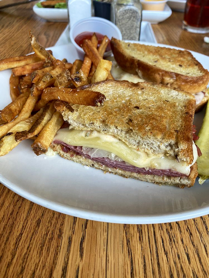 The Reuben arrives like a work of art&mdash;perfectly grilled rye embracing corned beef, Swiss, and sauerkraut with hand-cut fries standing guard.