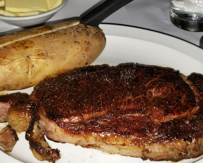 This isn't just a ribeye; it's a masterclass in meat. The perfect char giving way to juicy tenderness is worth every mile of the journey.