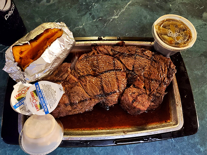 Behold the star of the show: a ribeye so magnificent it deserves its own ZIP code. That perfect sear isn't just cooking&mdash;it's a love letter to beef.