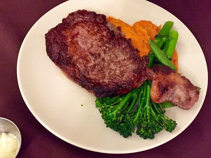 This ribeye achieves what every steak dreams about &ndash; a perfect char outside, blushing pink perfection within.