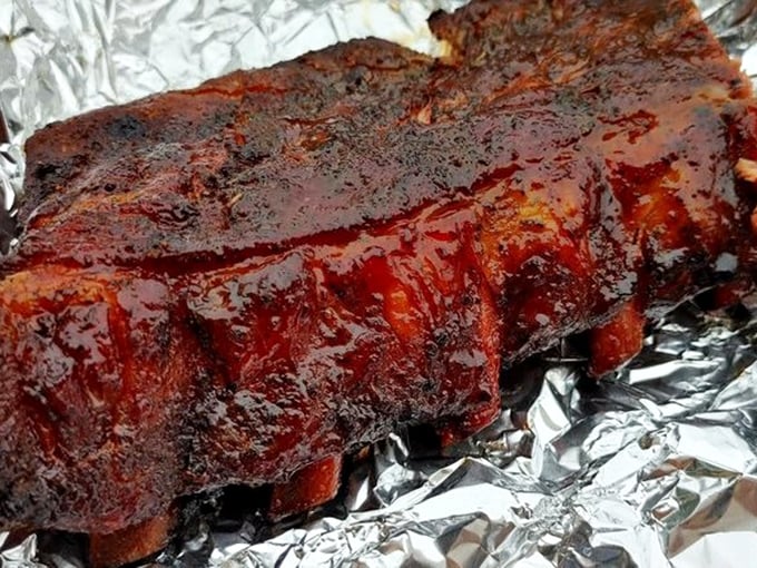 These ribs don't just fall off the bone&mdash;they practically leap with joy after their 14-hour smoke bath in apple and cherry wood.