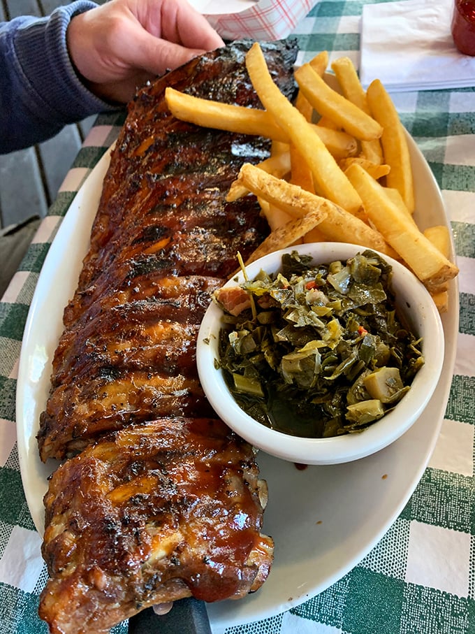 Fall-off-the-bone ribs that would make a vegetarian question their life choices. Served with fries and greens that don't stand a chance.