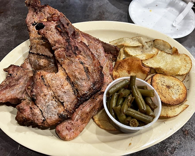 These aren't just ribs; they're a smoky manifesto on a plate. The pink smoke ring is nature's way of saying "you're welcome."